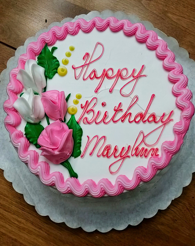 Pink roses and perfect piping &ndash; this birthday cake means business, the happy kind.