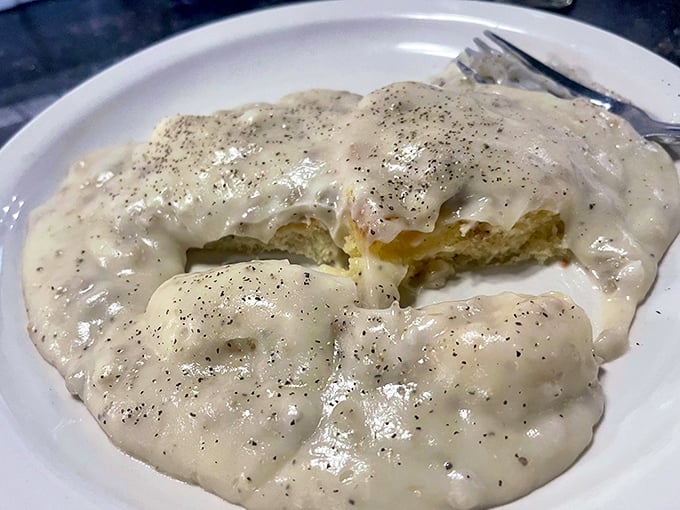 These biscuits and gravy aren't just a side dish&mdash;they're the main event, with pepper-speckled country gravy blanketing pillowy biscuits like a warm Southern hug.