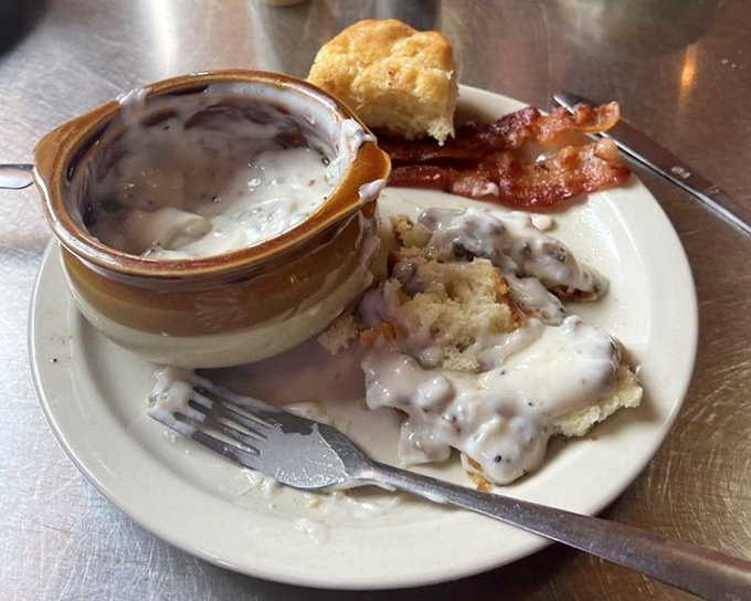 Biscuits and gravy that would make your grandmother both proud and jealous. That gravy boat should come with a lifeguard.