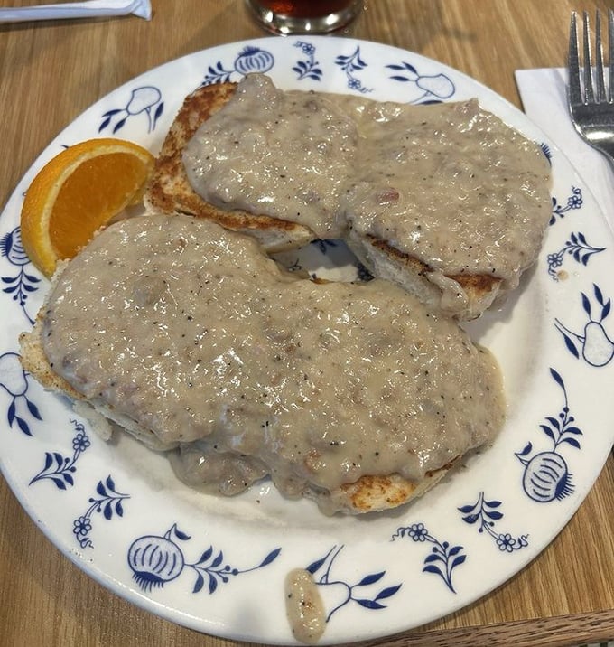 Biscuits smothered in creamy gravy &ndash; proof that Al Johnson's honors American classics alongside its Swedish specialties. The best of both worlds.