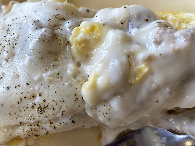Beneath that velvety blanket of country gravy lies a breakfast that's been solving morning hunger emergencies for generations of Floridians.