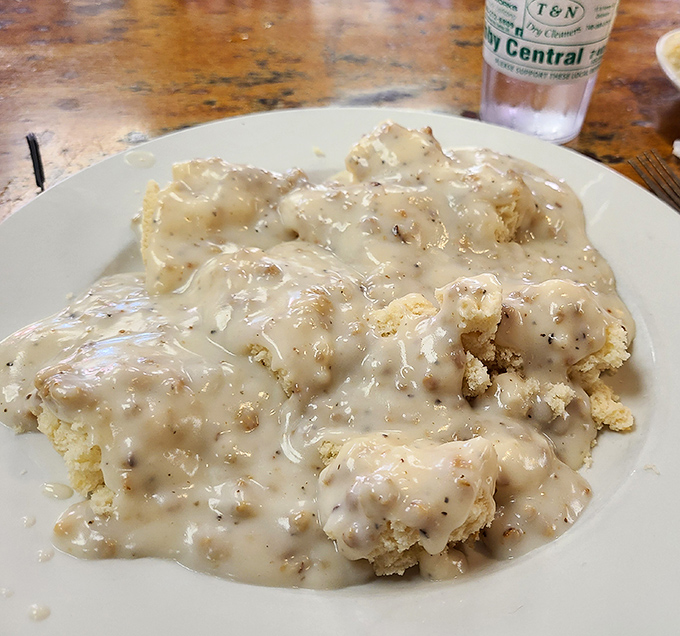 Biscuits and gravy &ndash; the breakfast that hugs you from the inside, where pepper-flecked country gravy blankets every delicious morsel.