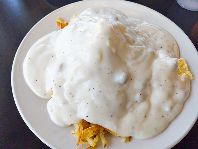 The biscuits and gravy here don't just smother&mdash;they embrace. A peppery white blanket tucking in those fluffy biscuits for the nap they'll never take.