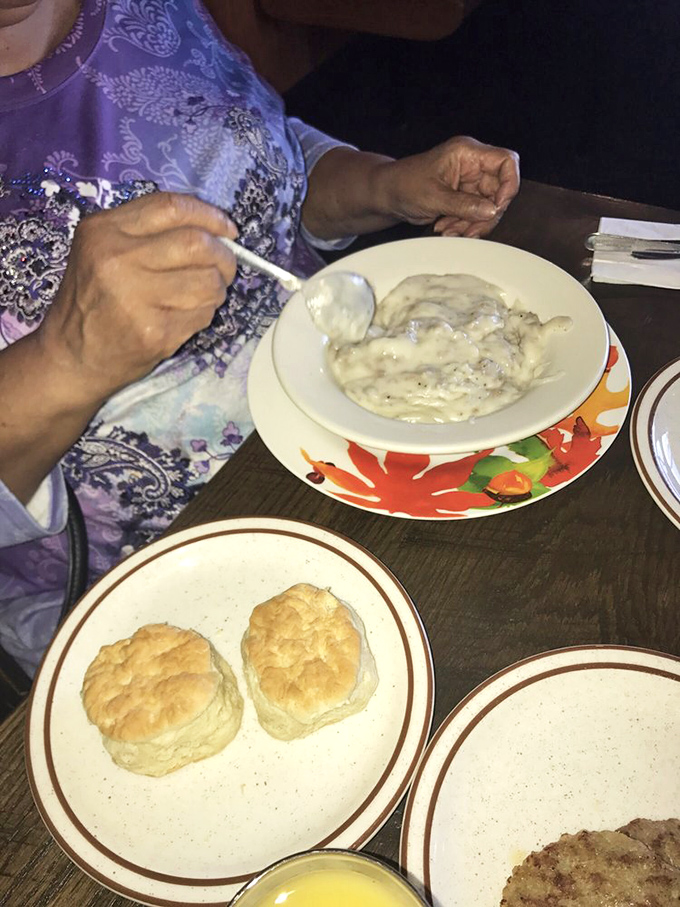 Fluffy biscuits meet country gravy in a partnership more perfect than Bogart and Bacall. The side plates stand ready for the overflow.
