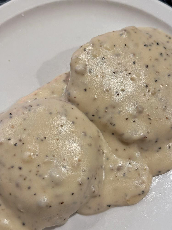 Biscuits and gravy &ndash; the comfort food equivalent of a warm hug from your grandmother, with pepper specks promising that perfect savory kick.