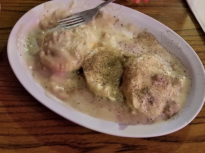 Biscuits and gravy that would make your grandmother both proud and jealous—comfort food that wraps around your soul like a warm blanket.