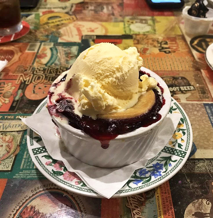 Blackberry cobbler &agrave; la mode &ndash; because sometimes dessert needs to wear its Sunday best with vanilla ice cream.