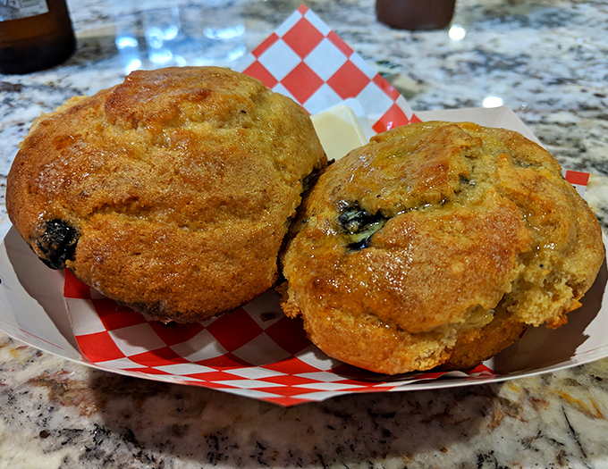 Cornbread muffins that straddle the sweet-savory divide like culinary tightrope walkers. These golden beauties might just upstage the meat &ndash; almost.