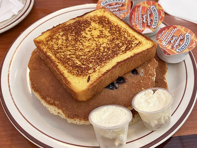 Whoever said "you can't improve on perfection" never tried putting French toast atop blueberry pancakes. This breakfast mashup is the culinary equivalent of finding money in old jeans.
