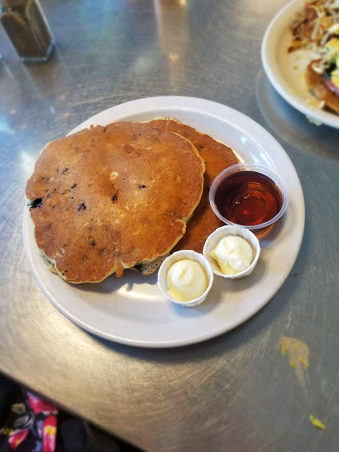 Blueberry pancakes that make you question why you ever eat anything else. The butter melts like your resolve to "just have one."