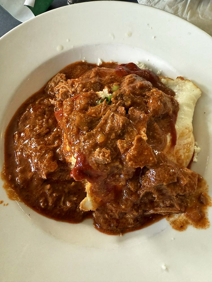 This isn't just pork shoulder&mdash;it's meat transformed by chile alchemy into something so tender it practically surrenders to your fork.