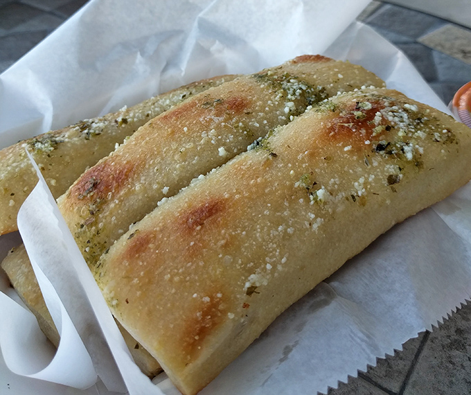 Those legendary breadsticks emerge golden and glistening, ready to convert even the most devoted dinner roll loyalists.
