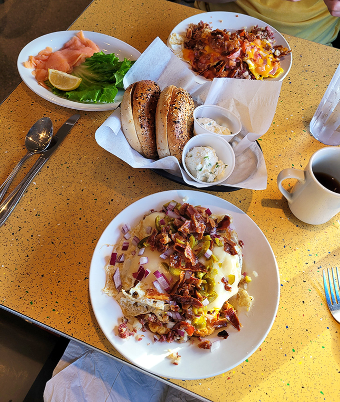 Breakfast spread that would make your cardiologist wince and your taste buds sing&mdash;bagels, lox, and eggs done the way deli gods intended.