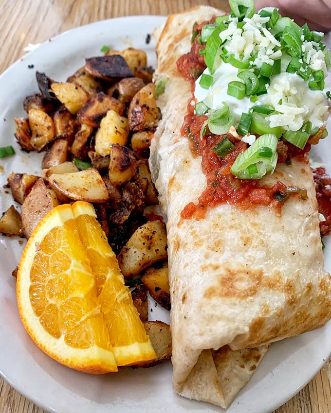 This breakfast burrito wraps up morning happiness with roasted potatoes that deserve their own fan club.