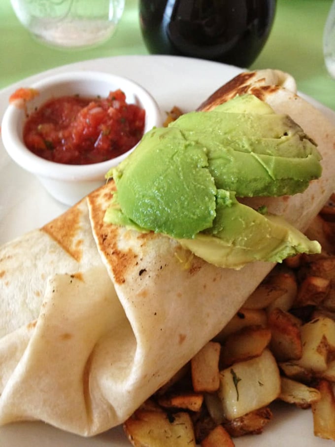 Breakfast burritos should always look this good&mdash;stuffed with goodness, crowned with avocado, and served with a side of morning happiness.