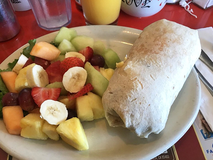 A fruit plate that could double as an artist's palette, paired with a breakfast burrito substantial enough to fuel a redwood hike.