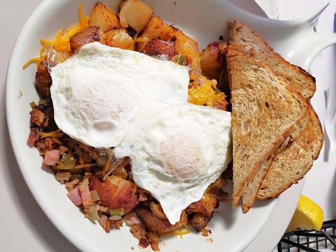 A breakfast hash that means business, topped with perfectly cooked sunny-side-up eggs. This plate doesn't just feed you&mdash;it sustains you through whatever the day throws your way.