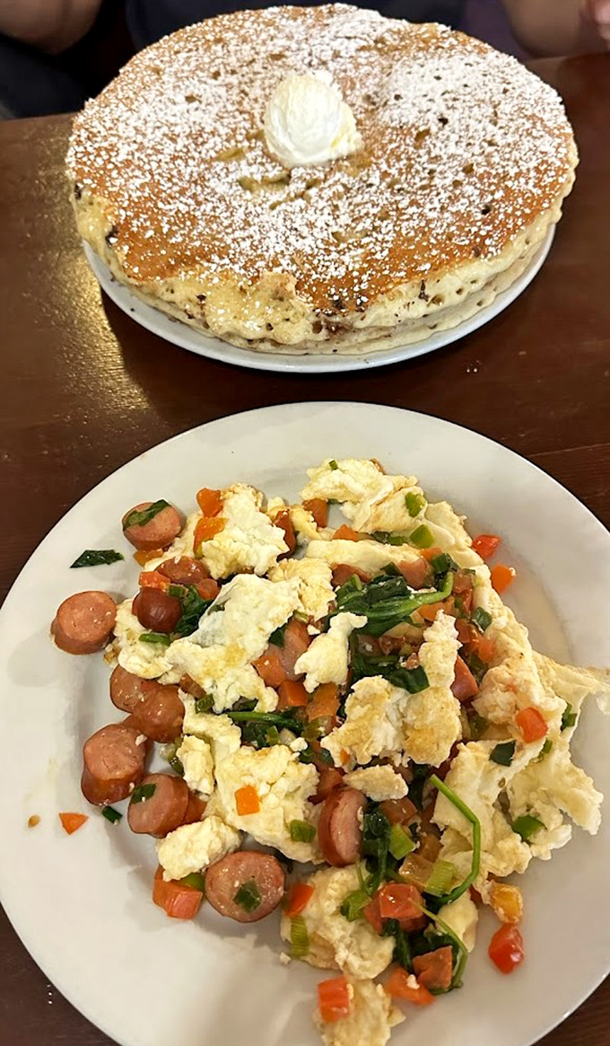 Breakfast alchemy at its finest&mdash;fluffy pancakes that could double as a pillow, paired with eggs that bring savory balance to sweet excess.