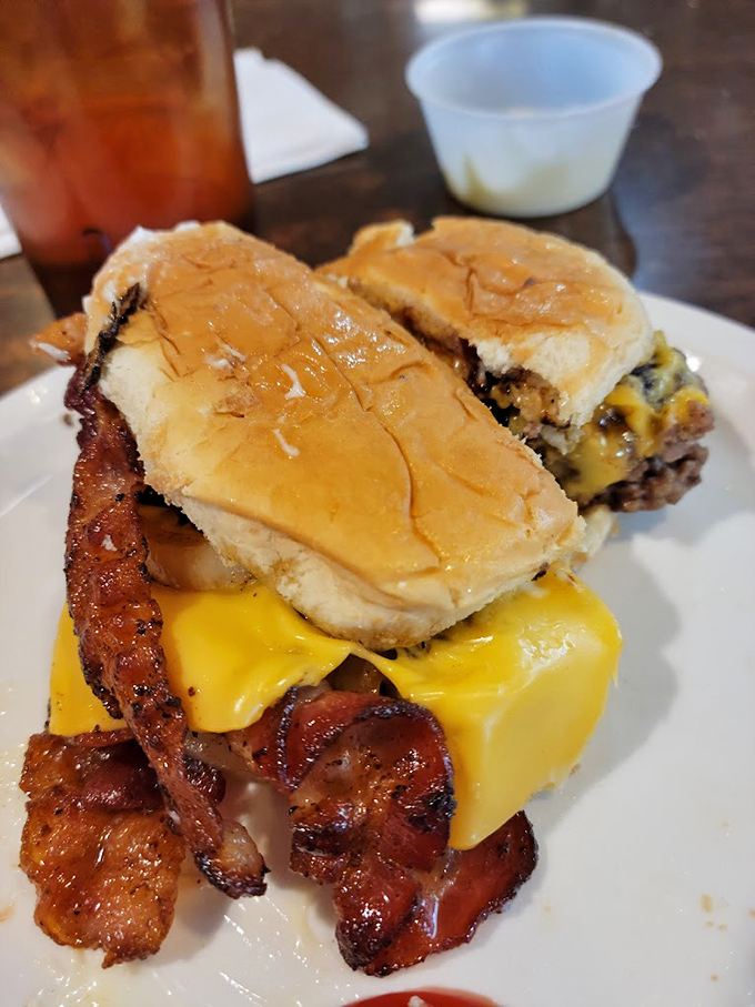 This breakfast sandwich understands the delicate architecture required to balance eggs, cheese, and crispy bacon between toasted bread perfection.