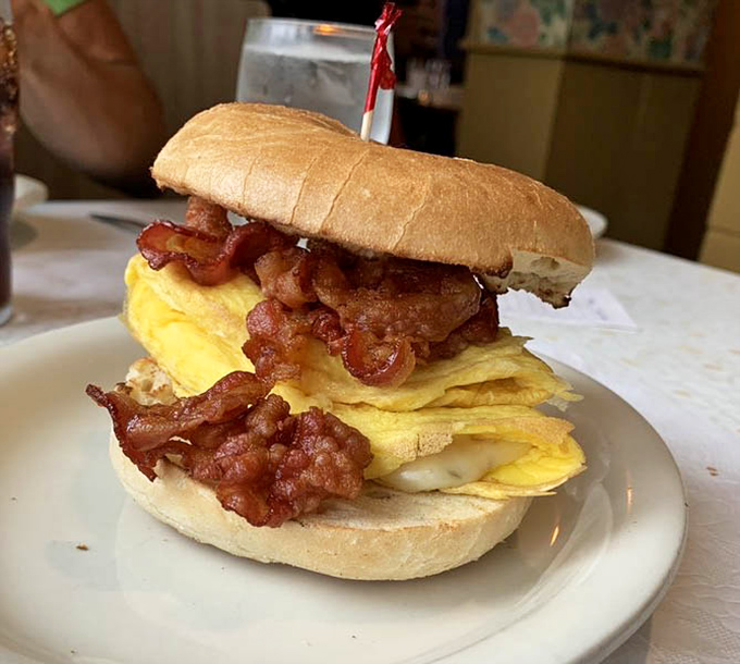 Breakfast sandwich architecture at its finest&mdash;where eggs, bacon, and bread come together in a harmony that makes morning meetings actually worth attending.