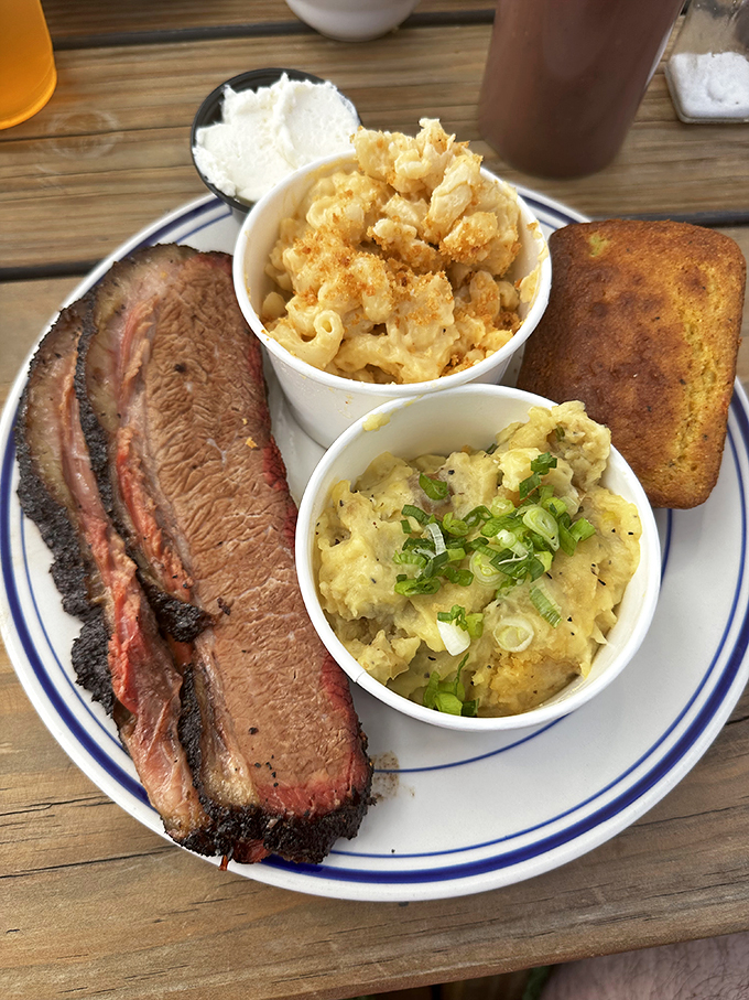 Brisket with that perfect pink smoke ring is barbecue's equivalent of finding the Holy Grail. The sides aren't afterthoughts—they're worthy companions.