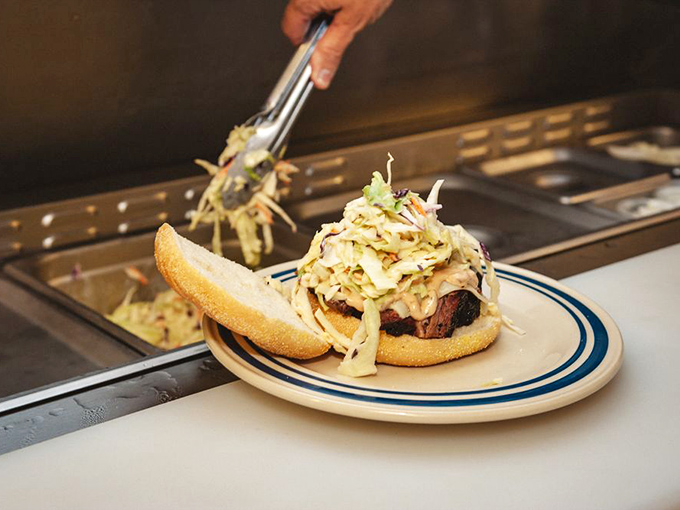 A sandwich that requires both hands and several napkins &ndash; the hallmark of authentic barbecue that doesn't apologize for being messy.