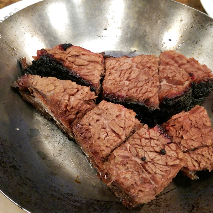 Brisket burnt ends: where barbecue transcends into religious experience. These caramelized cubes of joy are what meat dreams are made of.