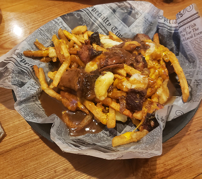 Poutine gets the brisket treatment here, transforming humble fries into a gravity-defying tower of comfort that's worth every napkin.
