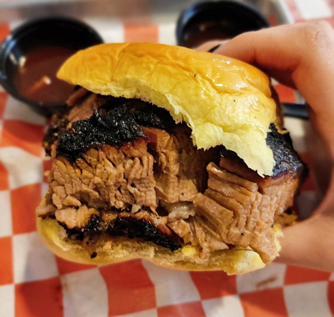 The brisket sandwich that ruins all future sandwiches. That smoke ring isn't just for show&mdash;it's a flavor halo sent from barbecue heaven.