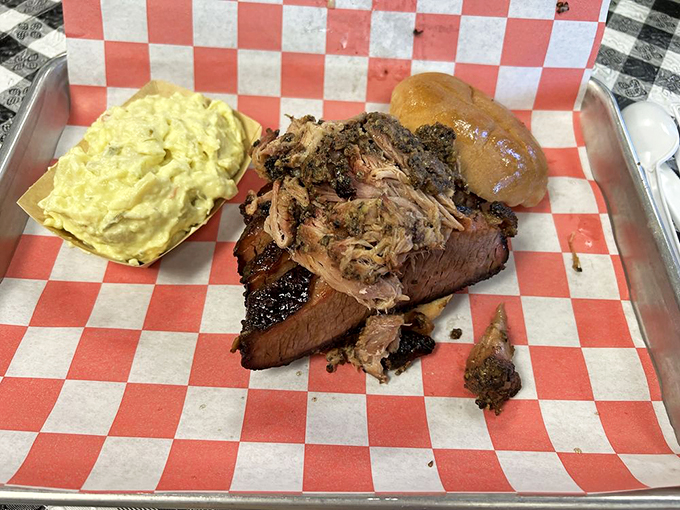 A proper brisket sandwich should require strategic planning before each bite. This one demands a napkin strategy worthy of a military campaign.