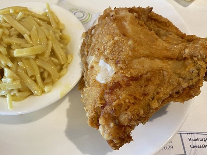 Golden-brown fried chicken that crackles with each bite, paired with homestyle noodles that would make any Midwestern grandmother nod in approval.