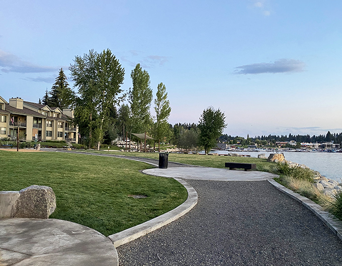 Lakeside paths that curve just right, inviting evening strolls where conversations flow as easily as the nearby water. Simple perfection.