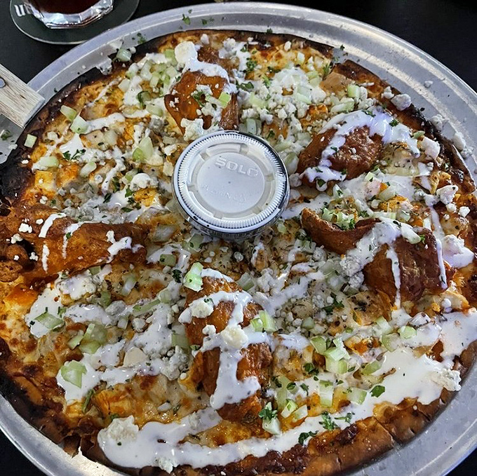 Pizza that breaks all the rules and gets away with it. This Buffalo chicken creation is what happens when bar food evolves into art.
