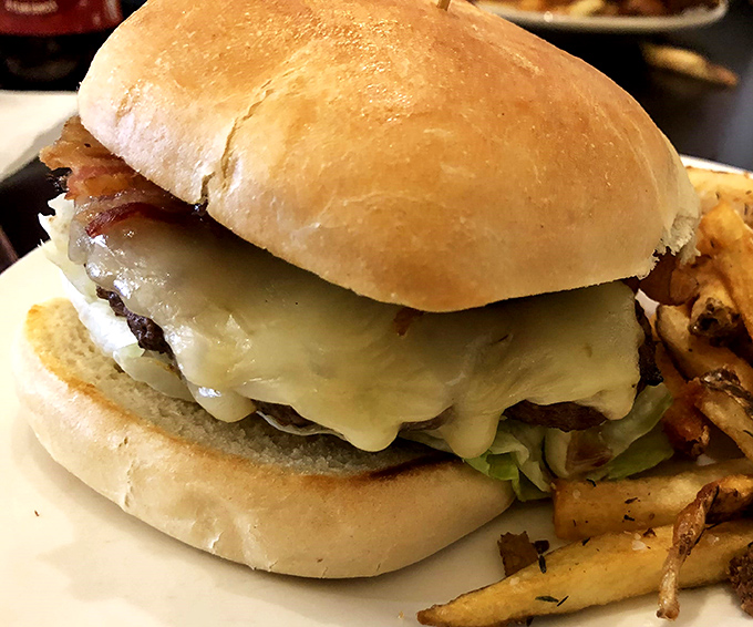 This burger doesn't just satisfy hunger – it practically gives you a warm hug with cheese.