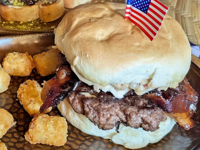 This burger stands tall and proud, like it knows it's about to change your whole day for the better.