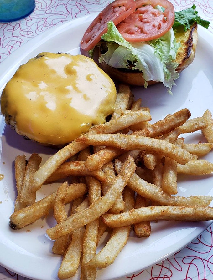 The cheeseburger here doesn't need fancy aioli or artisanal buns to impress&mdash;just perfectly melted American cheese, fresh veggies, and fries that snap when you bite them.