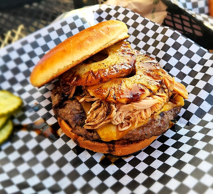 Behold the burger that launched a thousand road trips. That pulled pork topping isn't just a garnish&mdash;it's a game-changer.
