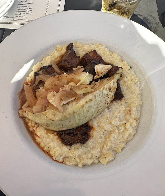 Burnt ends nestled on creamy grits&mdash;proof that when Midwest meets South, everybody wins, especially your taste buds.