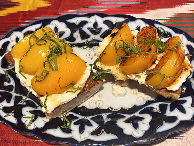 These toasted slices topped with roasted vegetables and creamy cheese prove that simple ingredients, when treated with respect, create magic.