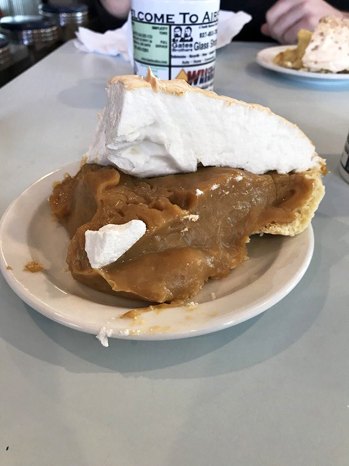 Butterscotch pie that makes time stand still. That meringue isn't just a topping&mdash;it's a cloud you could happily float away on.