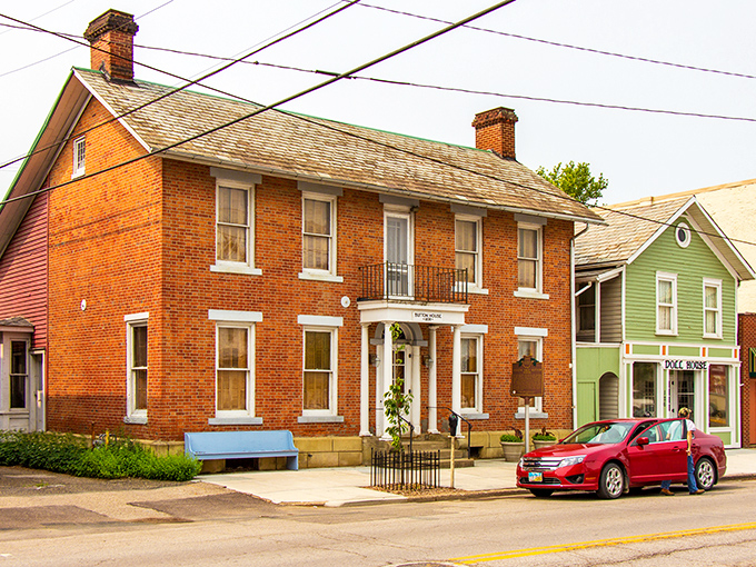 The Button House's classic brick exterior reminds us of an era when homes were built to last and front porches were social networks.