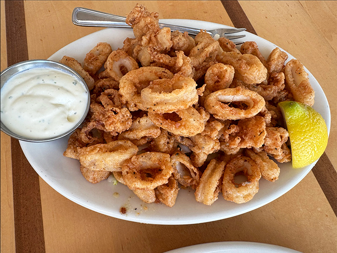 Calamari that's crispy, not rubbery—a rare achievement that deserves a standing ovation. The accompanying tartar sauce isn't optional; it's essential happiness.