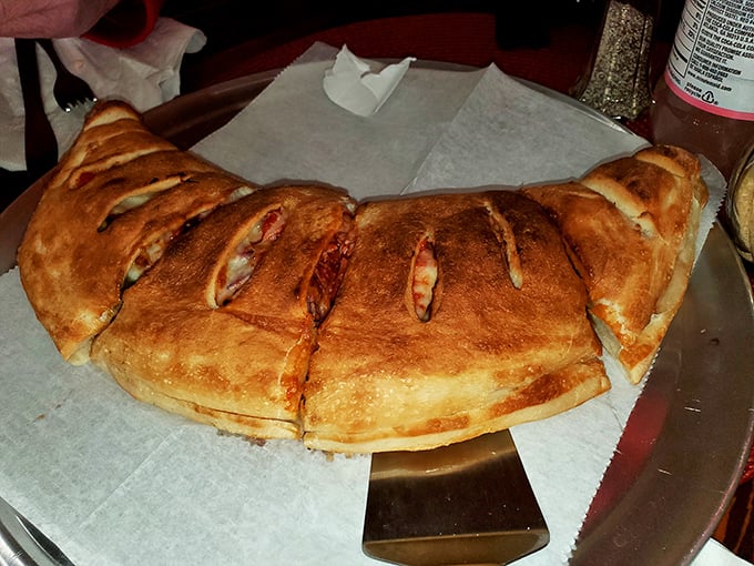 The calzone: nature's way of saying, "You know what would make pizza better? If we folded it and trapped all the good stuff inside."