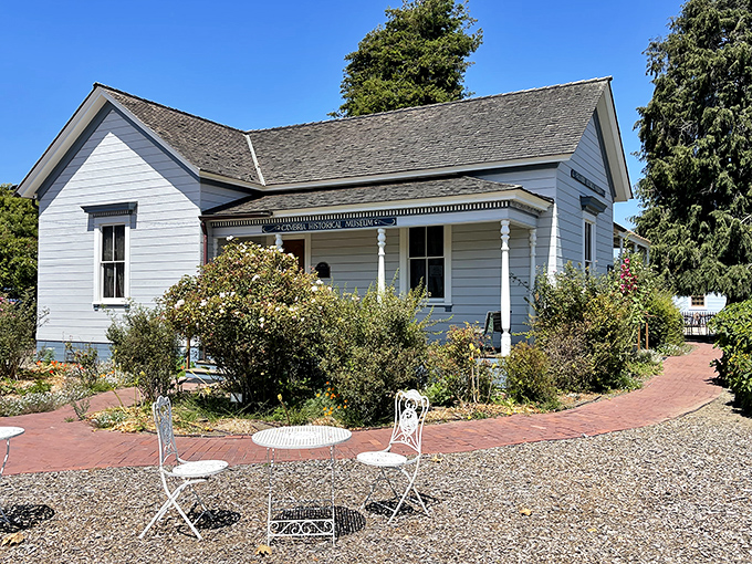 This charming white cottage with its welcoming porch practically begs you to sit awhile with a good book and better coffee.