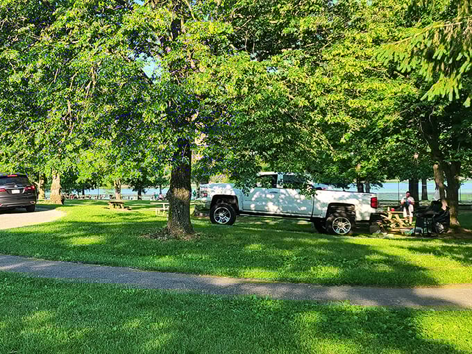 Camping spots nestled under a canopy of green, where your truck looks more at home than it ever does in the office parking lot.