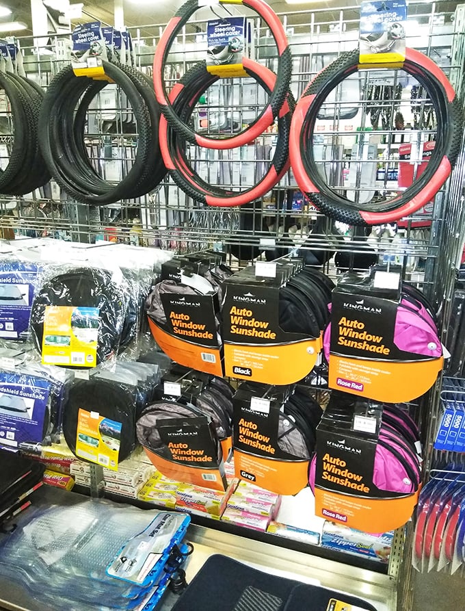Bike tires and car accessories hang like modern art installations. Your vehicle's next fashion statement is hiding somewhere in this aisle.