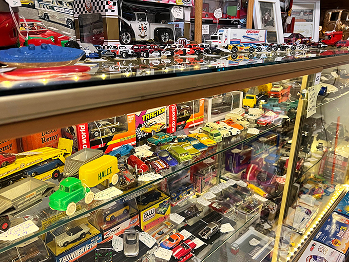 Miniature automotive history behind glass &ndash; from classic Americana trucks to racing legends, each tiny vehicle carries outsized memories of simpler times.