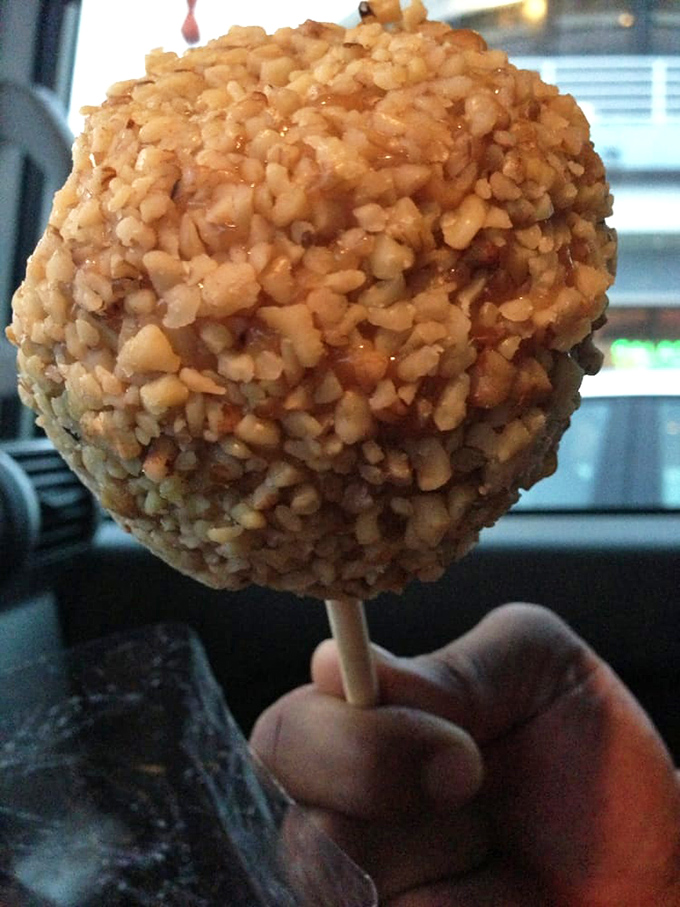 Not just a caramel apple—a crunchy, nutty orb of joy on a stick. Dentists hate this one simple treat!