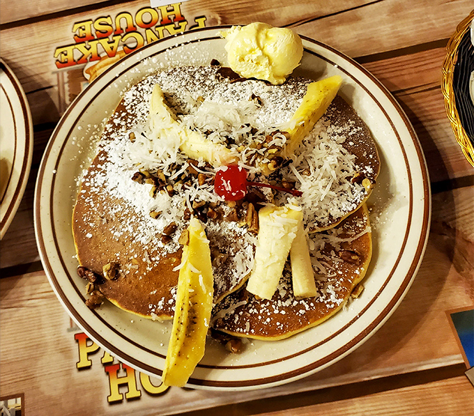 Tropical vacation on a plate! These Caribbean pancakes with banana, coconut, and pecans might make you forget you're in Tennessee, not Turks and Caicos.