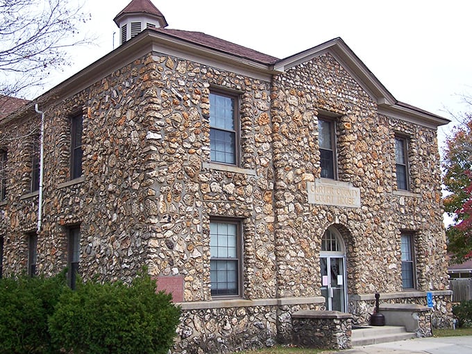 The Carter County Courthouse stands as a testament to craftsmanship, its river-rock exterior telling stories of local history and community pride.